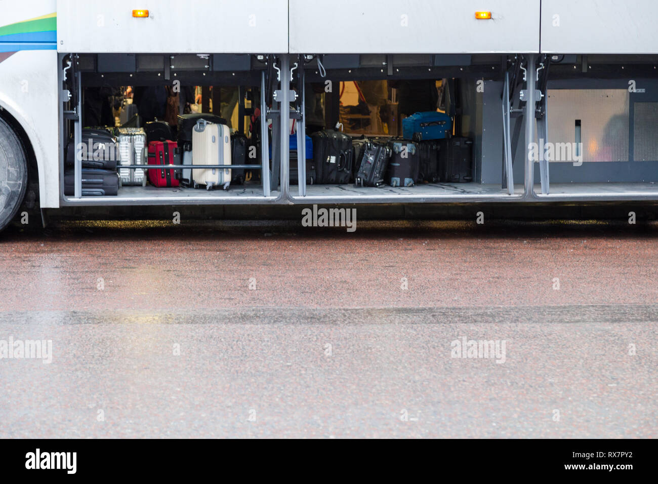 Cargo space of a bus with passengers luggage and big bags Stock Photo ...