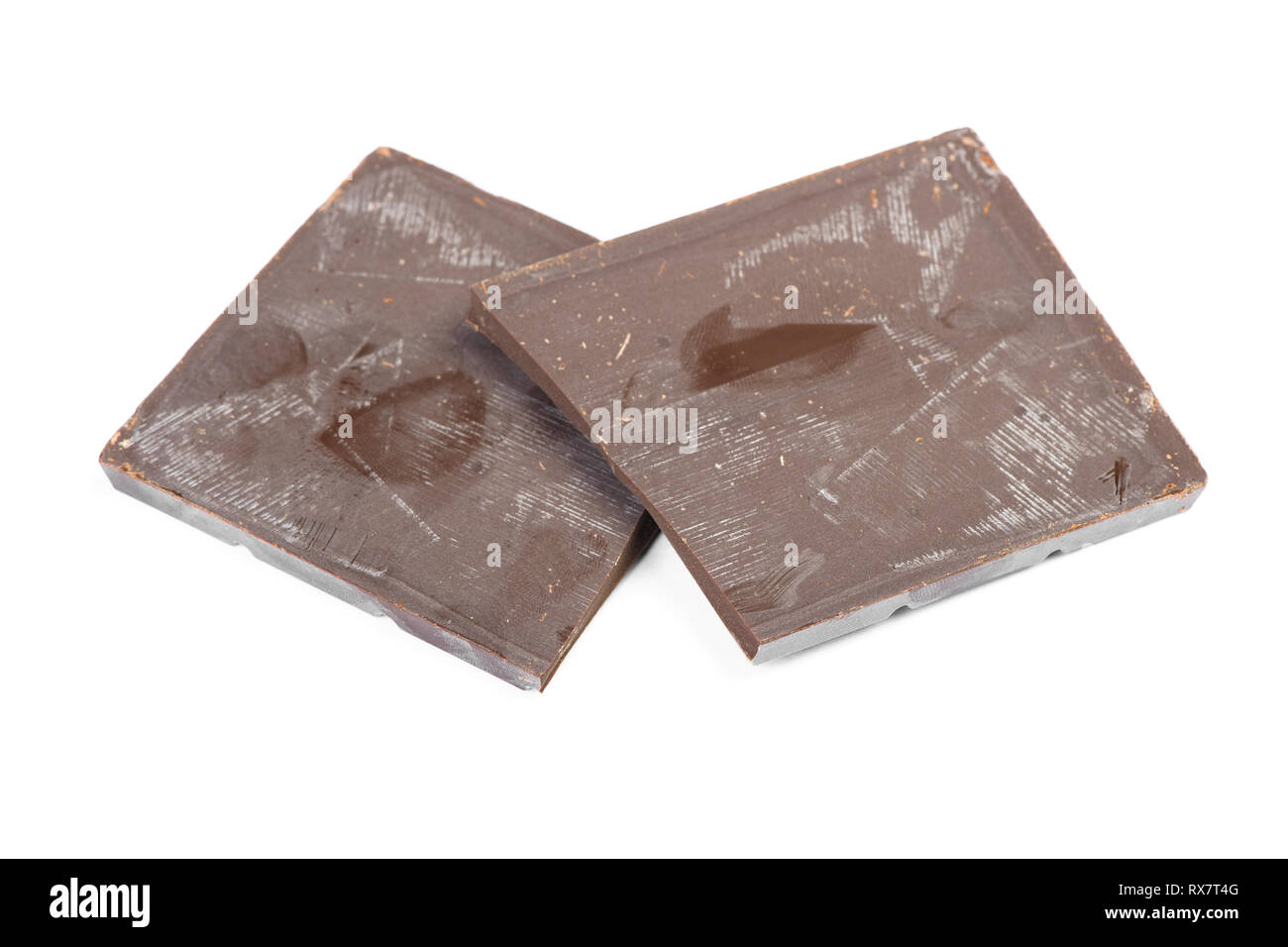 Pieces of broken bar of chocolate isolated on white Stock Photo - Alamy