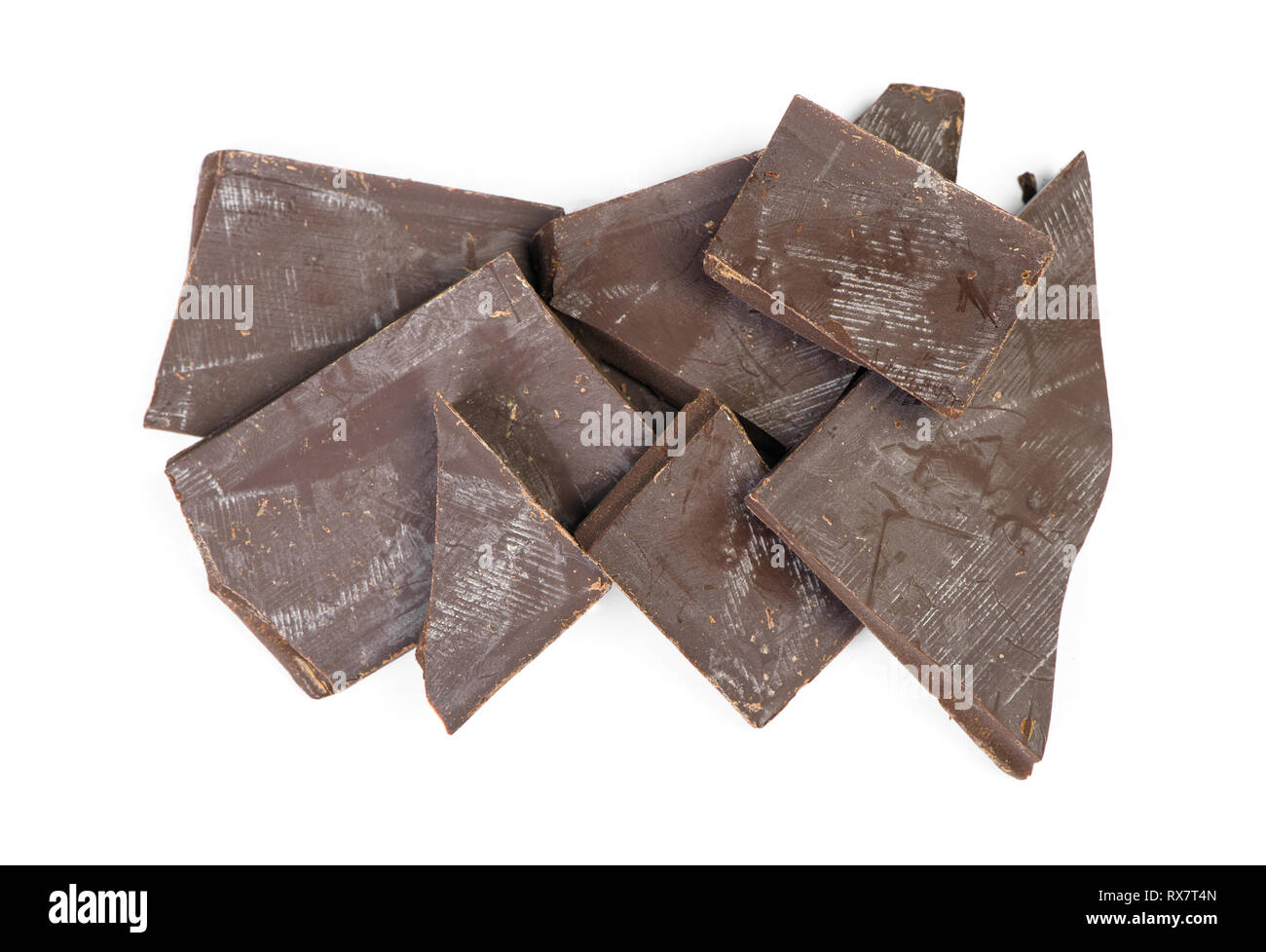 Pieces of broken bar of chocolate isolated on white Stock Photo - Alamy