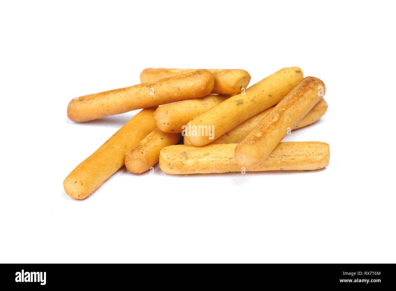Heap of wheat bread sticks with spices isolated on a white background ...