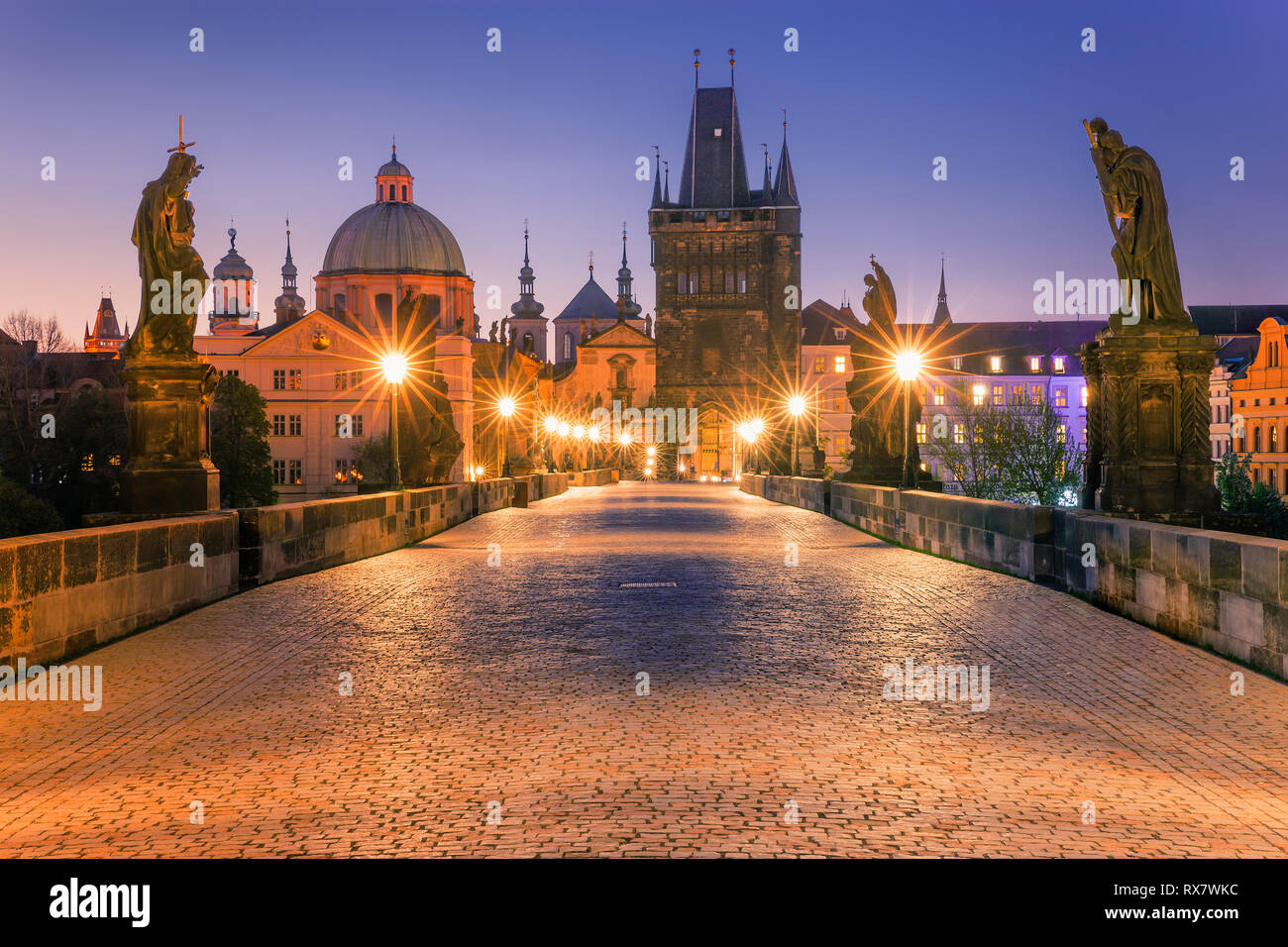 The famous Charles Bridge at sunrise in Prague in the Czech Republic ...