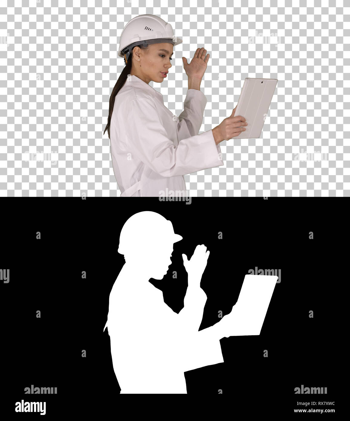 On Alpha Matte. Medium shot. Side view. Woman engineer with tablet ...