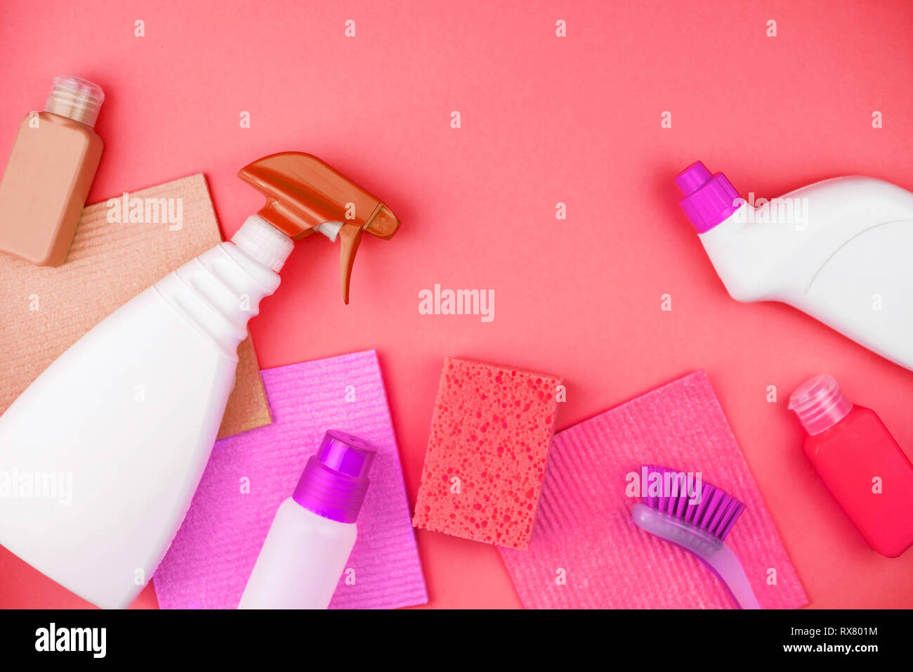 House cleaning products are on pink background Stock Photo - Alamy