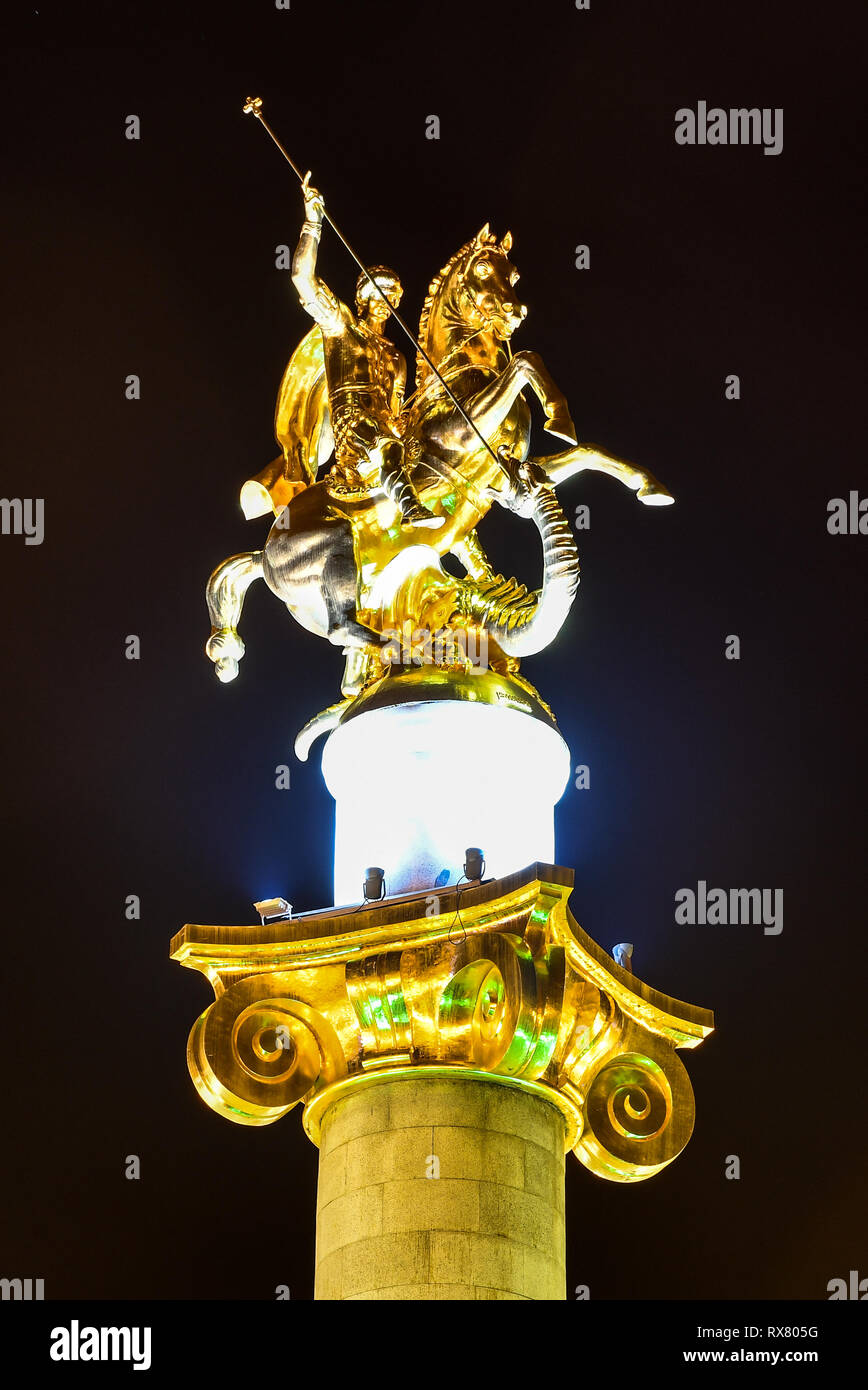 Golden statue of St. George on the main square of Tbilisi, capital city ...