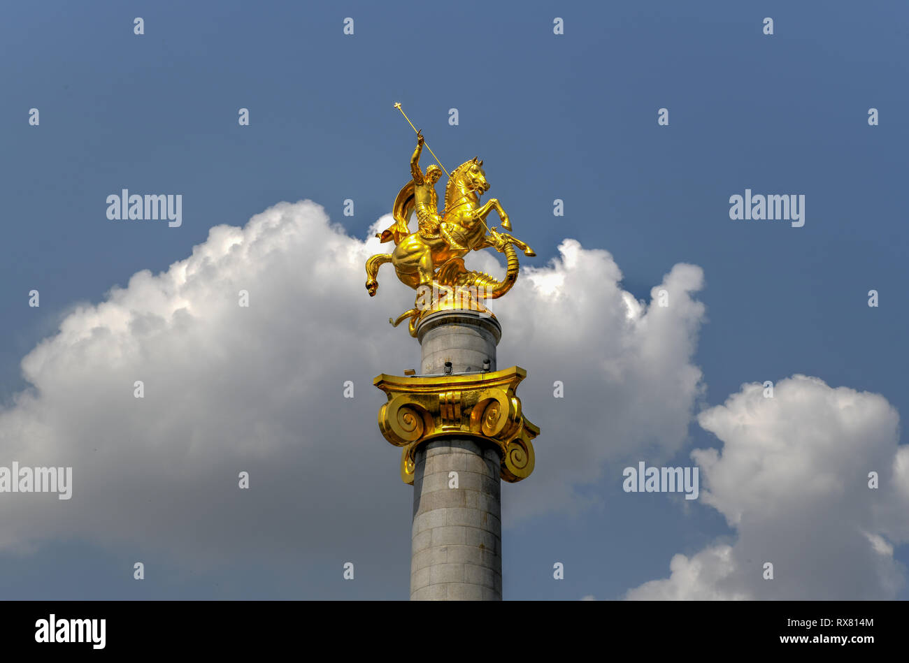 Golden statue of St. George on the main square of Tbilisi, capital city ...