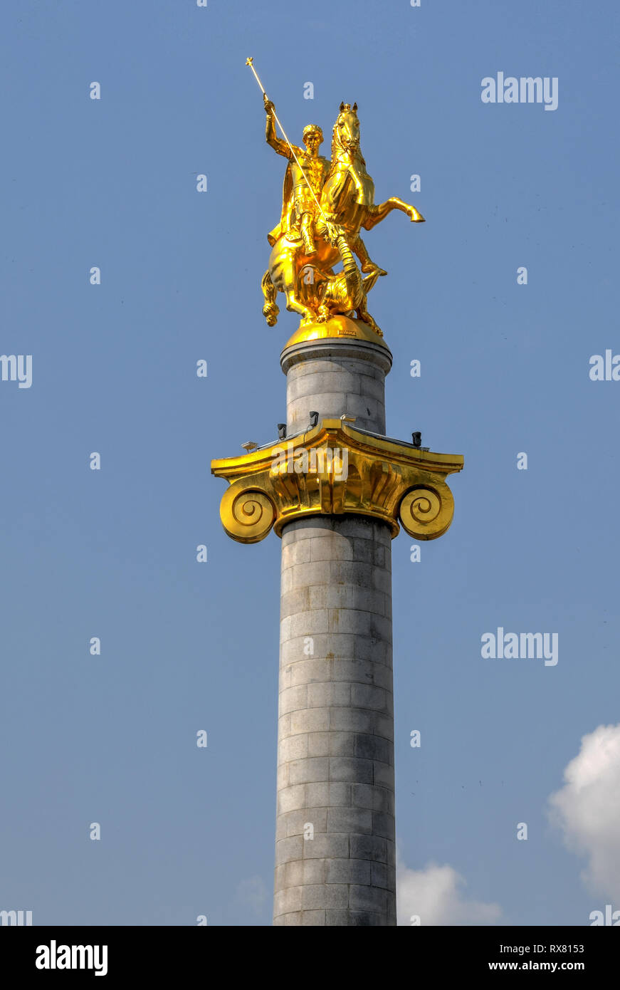 Golden statue of St. George on the main square of Tbilisi, capital city ...
