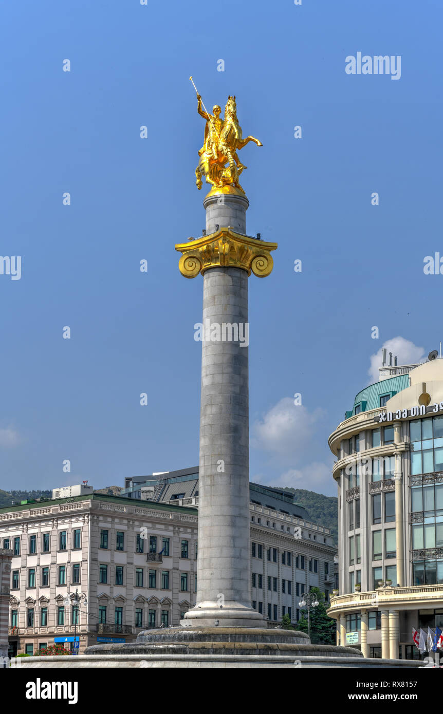 Golden statue of St. George on the main square of Tbilisi, capital city ...