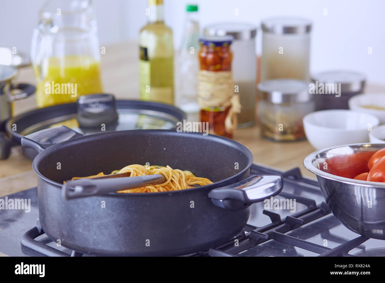 Composition with wooden board and ingredients for cooking on table ...