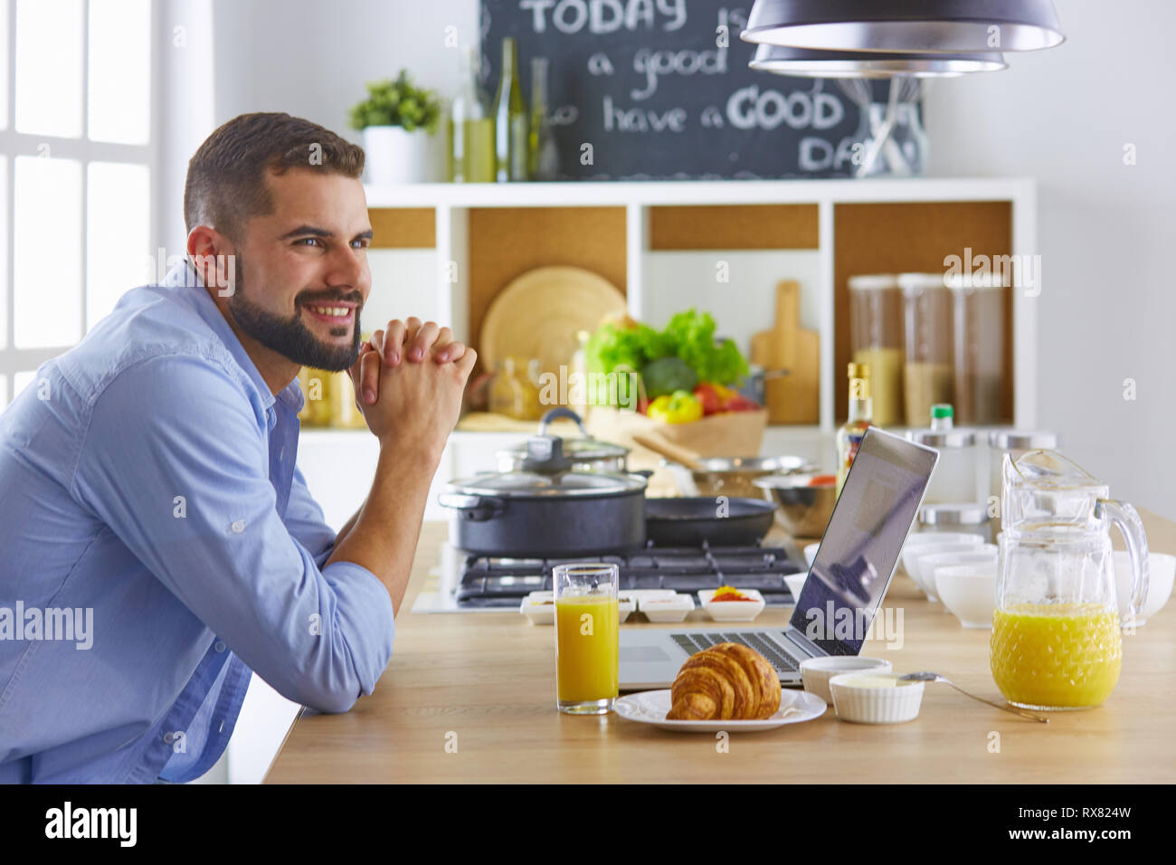 a business man breakfasts with notebook and juice Stock Photo - Alamy