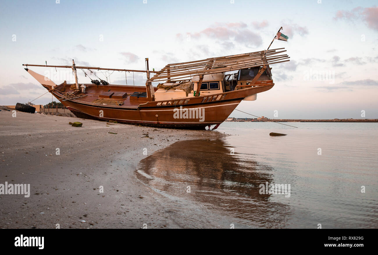 old dhow on a beach in Ras al Khaimah, United Arab Emirates Stock Photo ...
