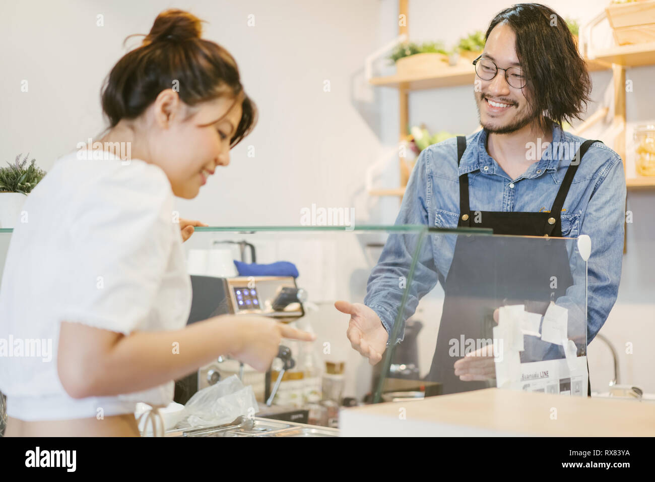 customer select and choose some food order to waiter at bar Stock Photo ...