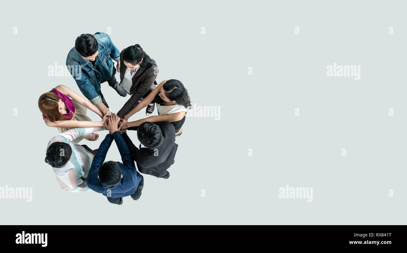 Top view of people in team stack hands together as unity and teamwork ...