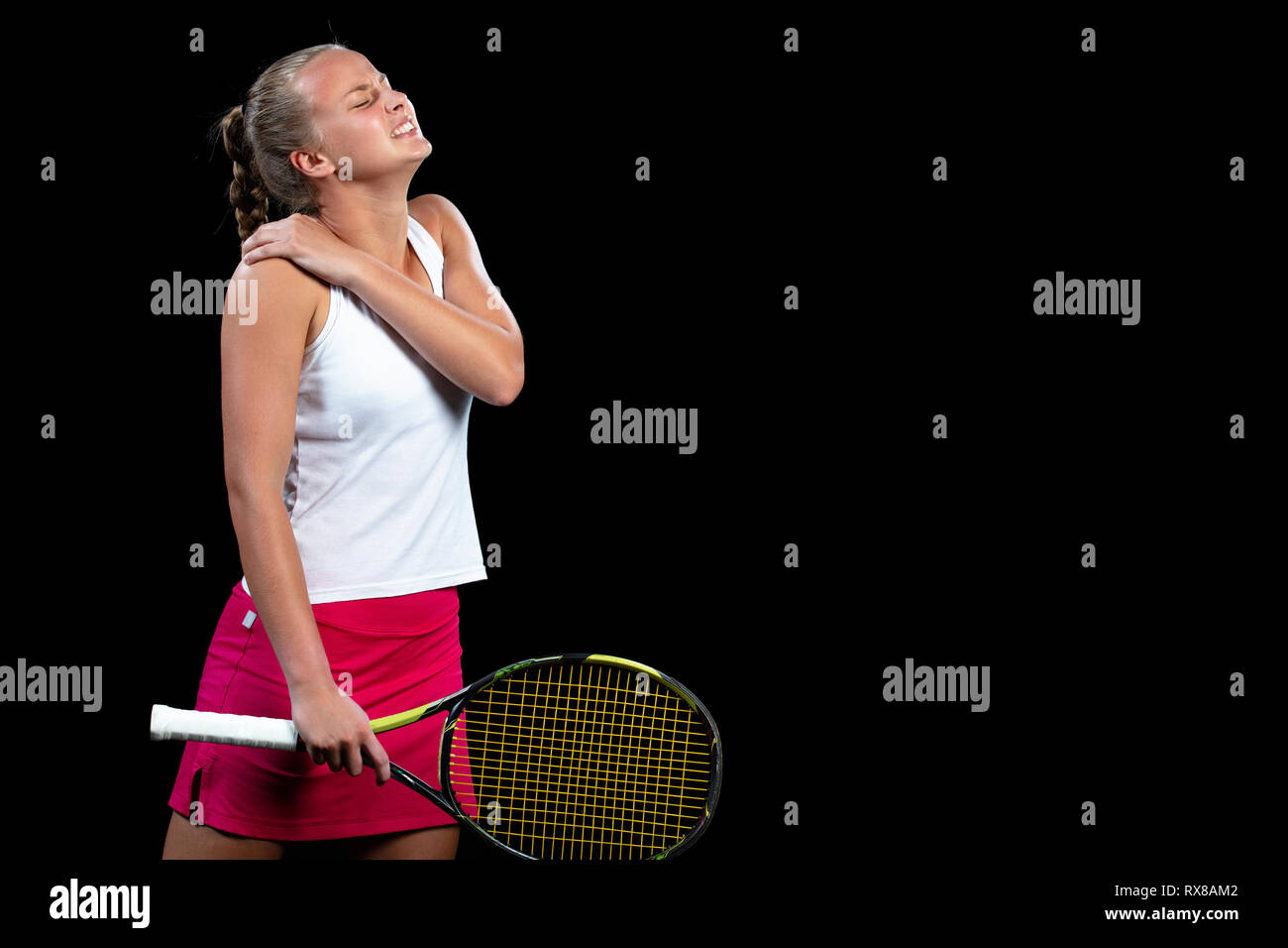 tennis woman player with injury holding the racket on a tennis court ...
