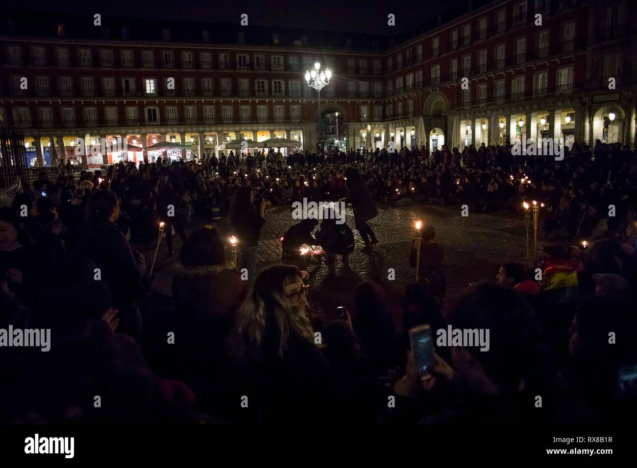Women seen lighting candles during the strike. Several women strike ...