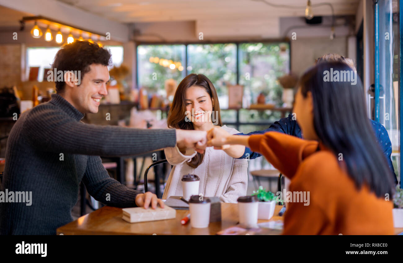 Team bump fists Hands of success startup business teamwork , colleague ...