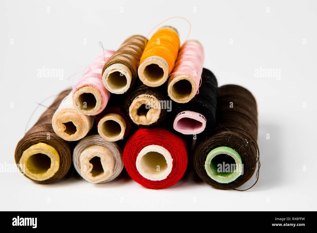 Old fashioned tailoring threads om pile in many colors. Start you handy ...