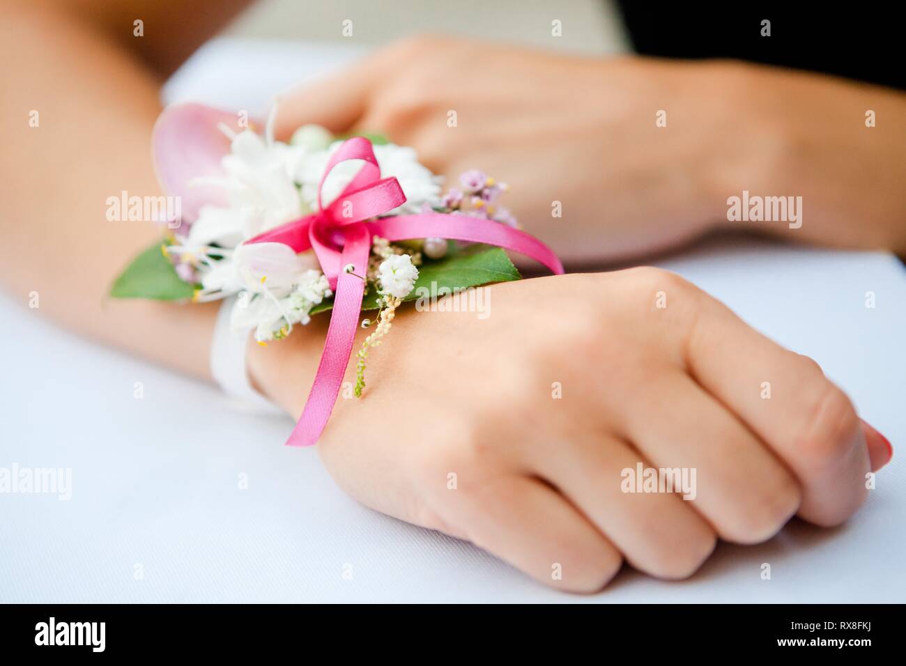 Decorated hand - flower wedding decor with ribbon Stock Photo - Alamy