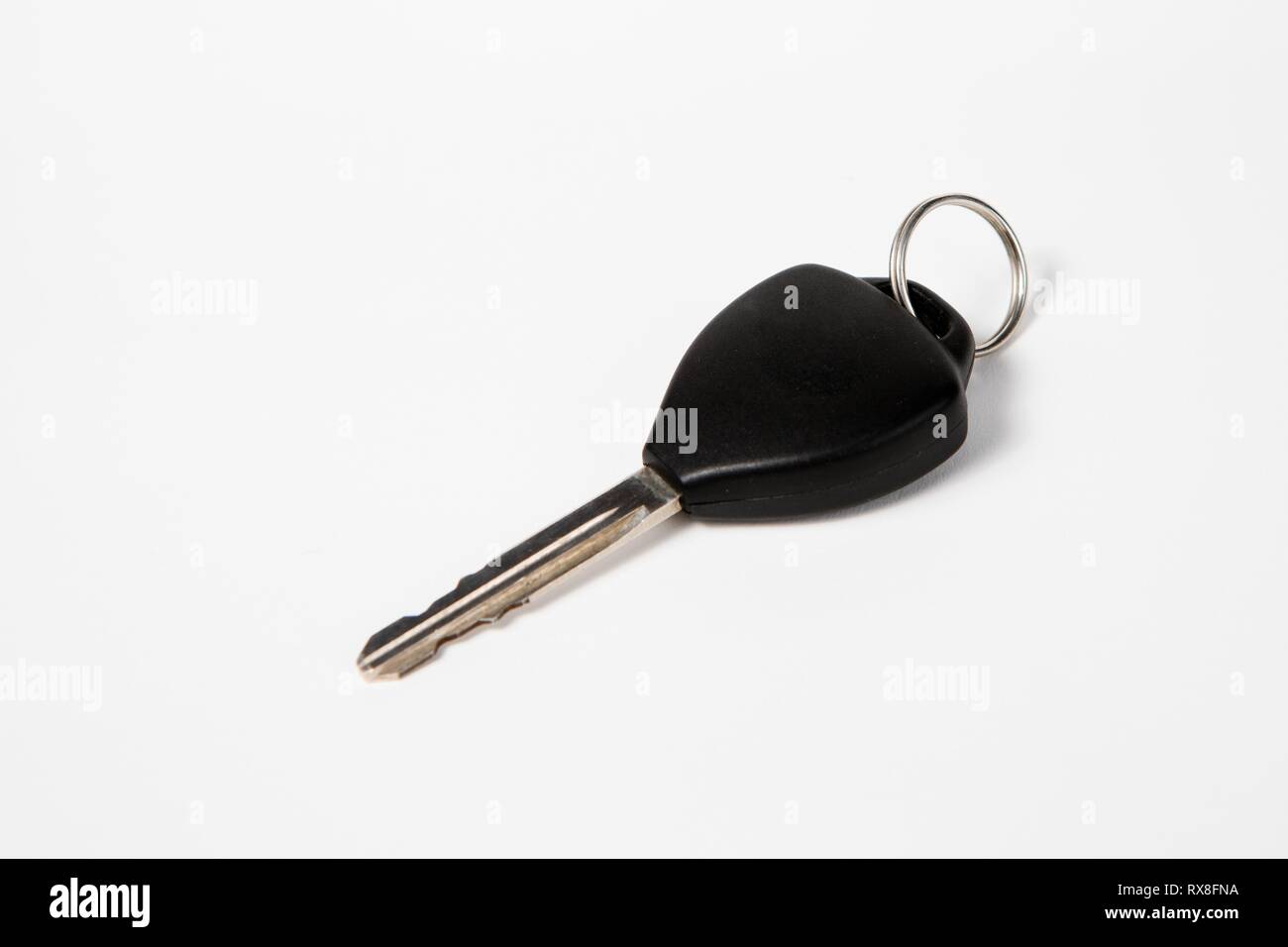 Plain black key for car on white background - just a key Stock Photo ...