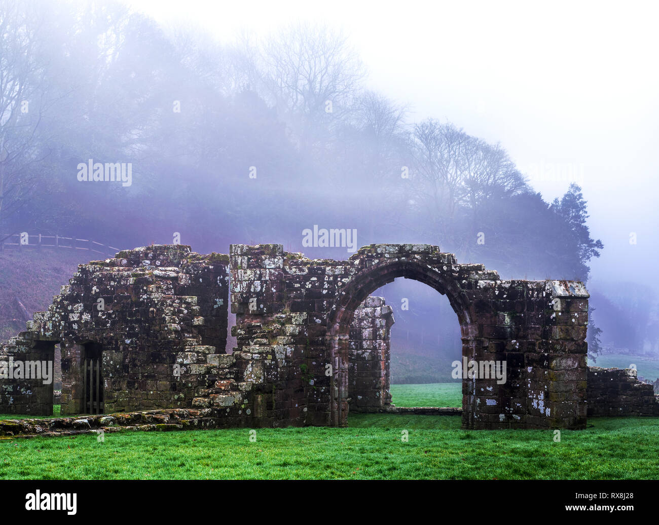 old medieval gateway with fog in trees Stock Photo - Alamy