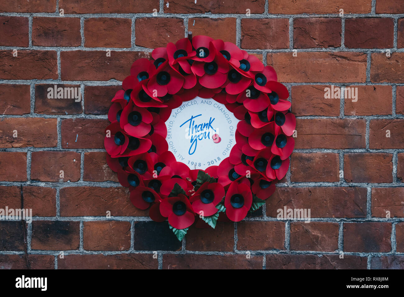 Remembrance red poppy wreath with a "Thank You" message inside on a ...