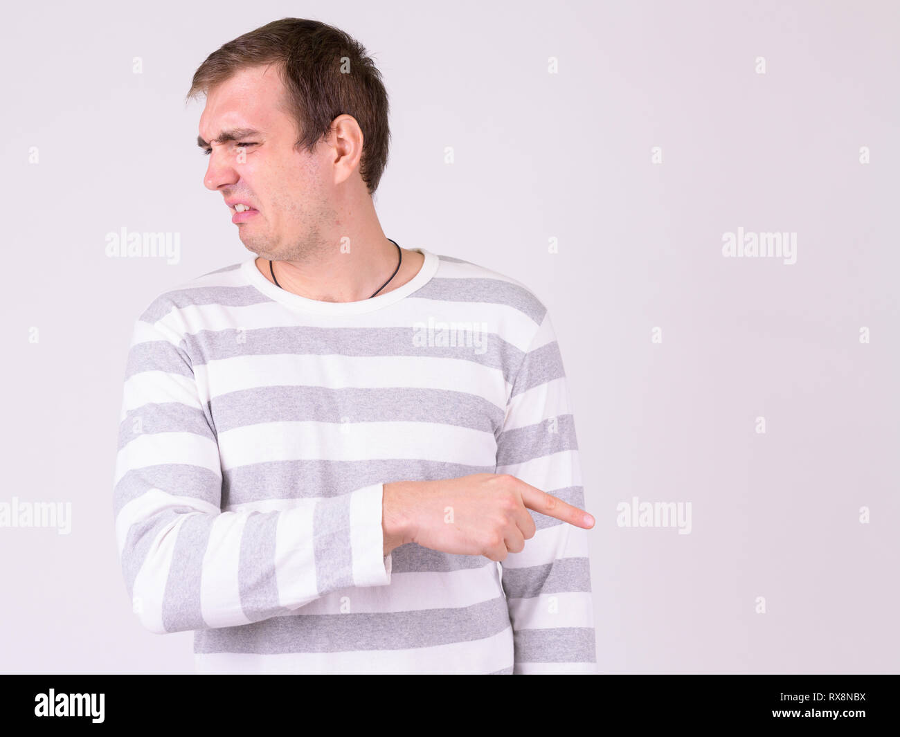 Portrait disgusted man finger hi-res stock photography and images - Alamy