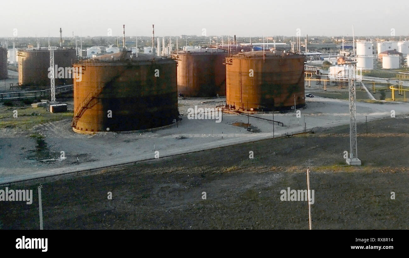 Tank the vertical steel. Oil refinery. Equipment for primary oil ...