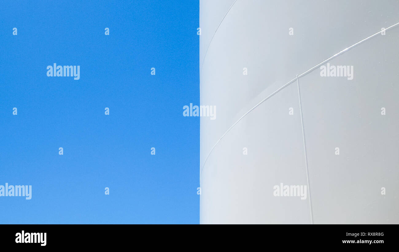 The tank with water and a ladder. Oil refinery. Equipment for primary ...