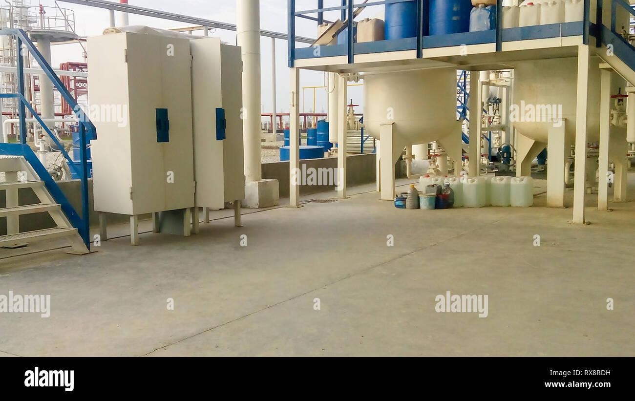 Tool box and a playground pouring chemical. The equipment for oil ...