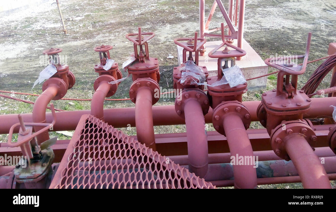 Valves on the pipeline for pumping oil. Pipes at the refinery Stock ...