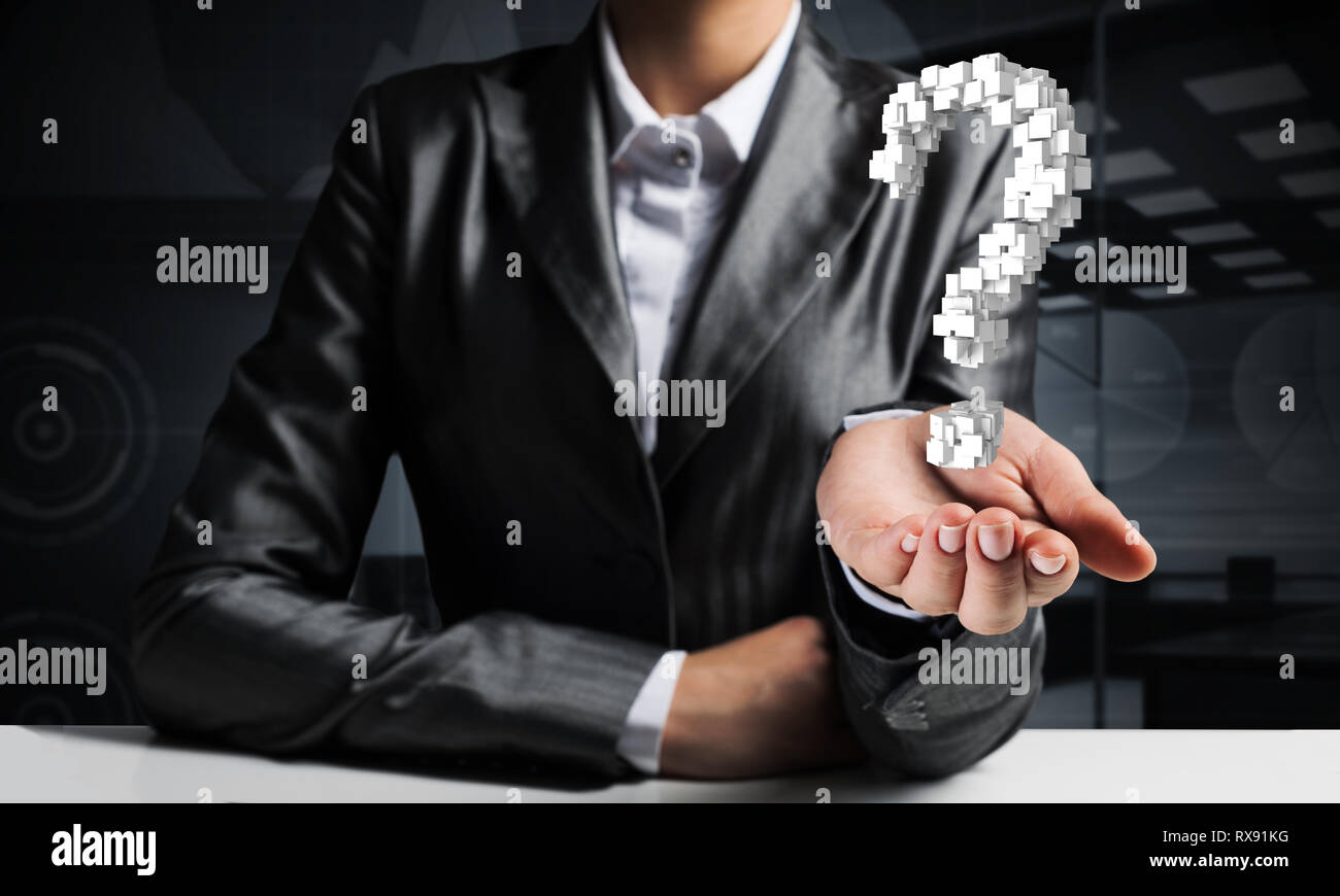 Businessman presenting question mark Stock Photo - Alamy