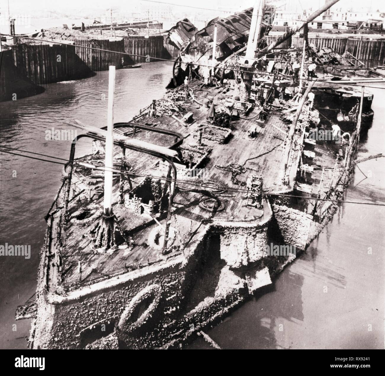 Barnacle Encrusted Hulk of U.S.S. Maine Being Raised From Harbor ...