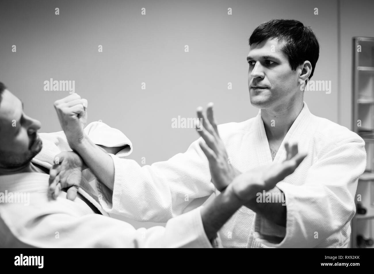 Male group fighting Black and White Stock Photos & Images - Alamy