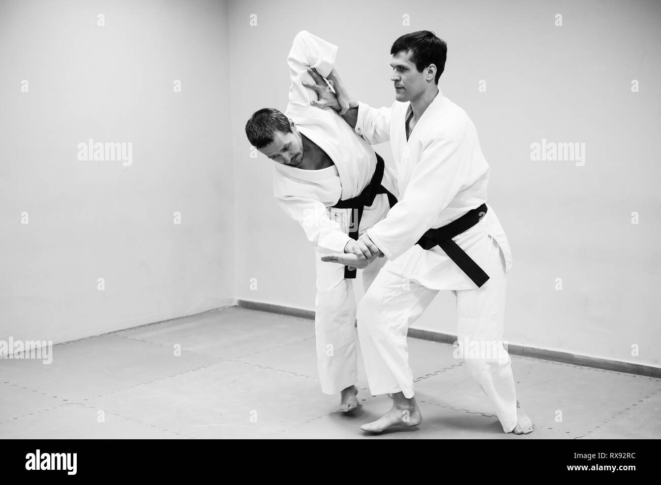 Male group fighting Black and White Stock Photos & Images - Alamy