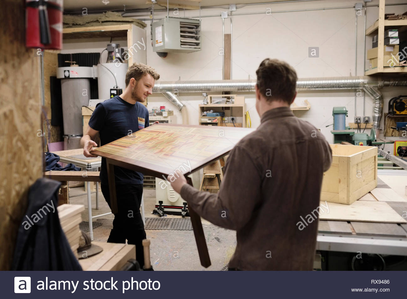 Table lifting hi-res stock photography and images - Alamy