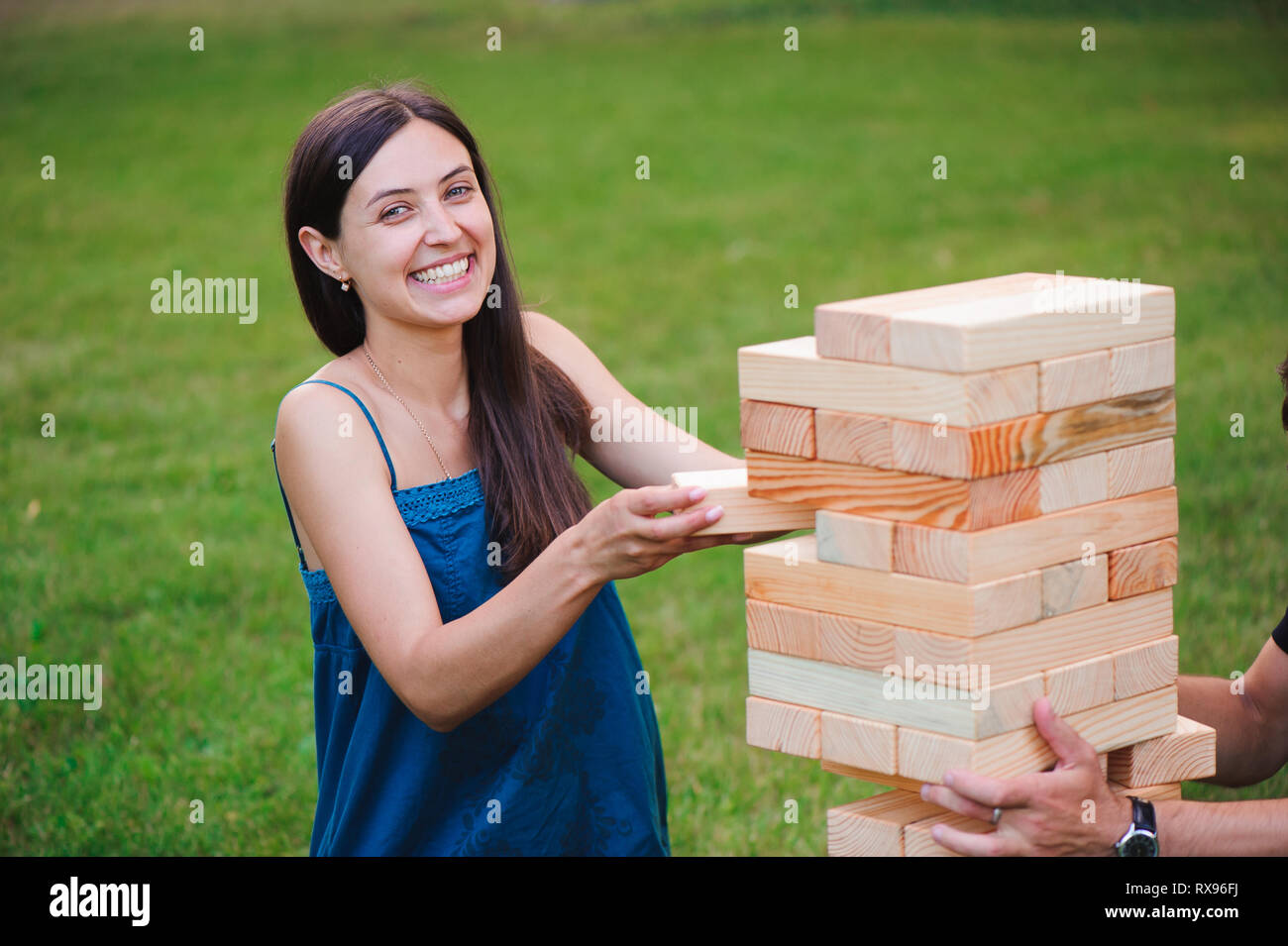 Giant Outdoor Block Game. The tower from wooden blocks Stock Photo - Alamy