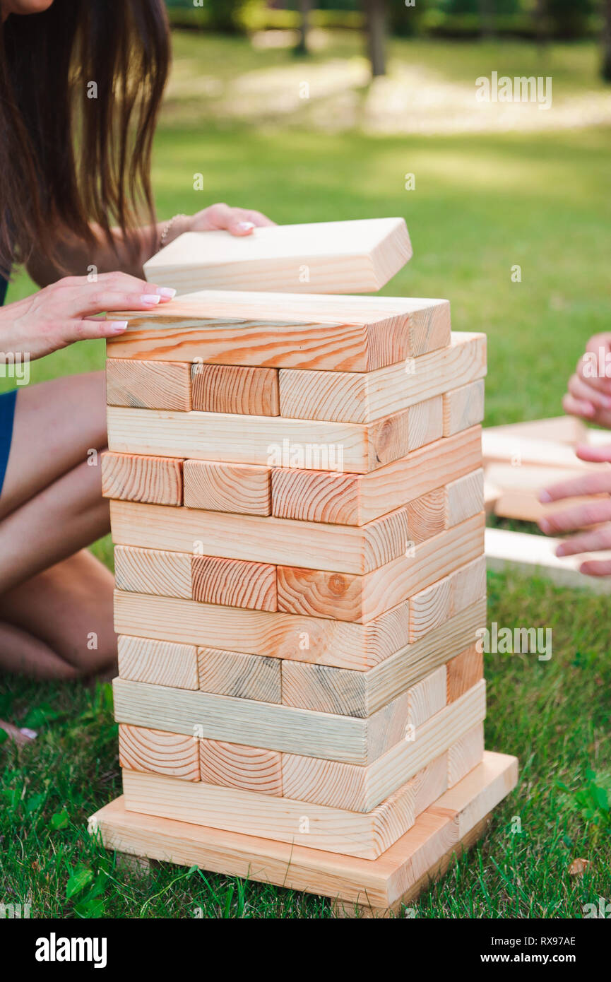 Giant Outdoor Block Game. The tower from wooden blocks Stock Photo - Alamy