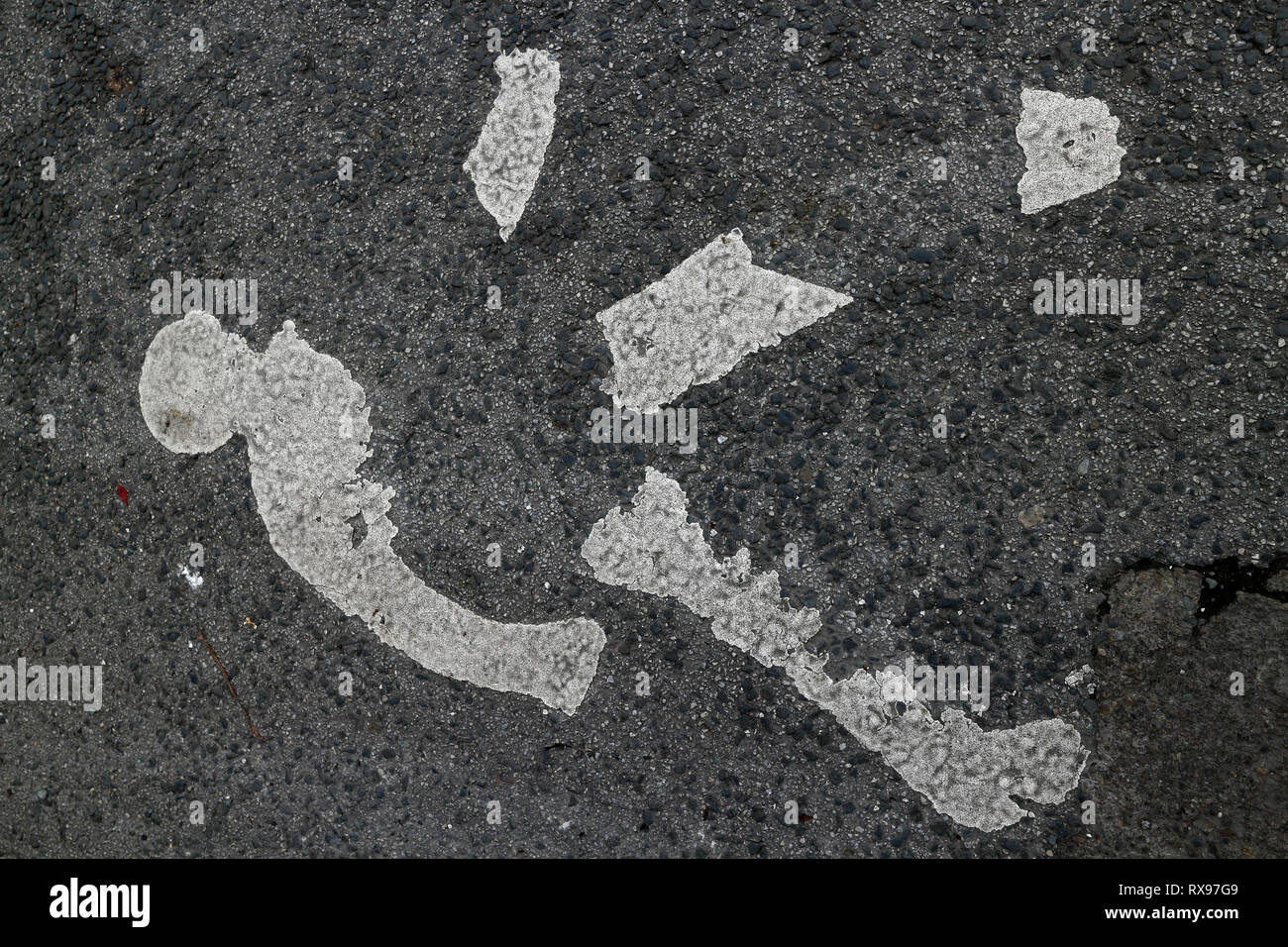 Pedestrian sign painted in white on the tarmac of a footpath Stock ...