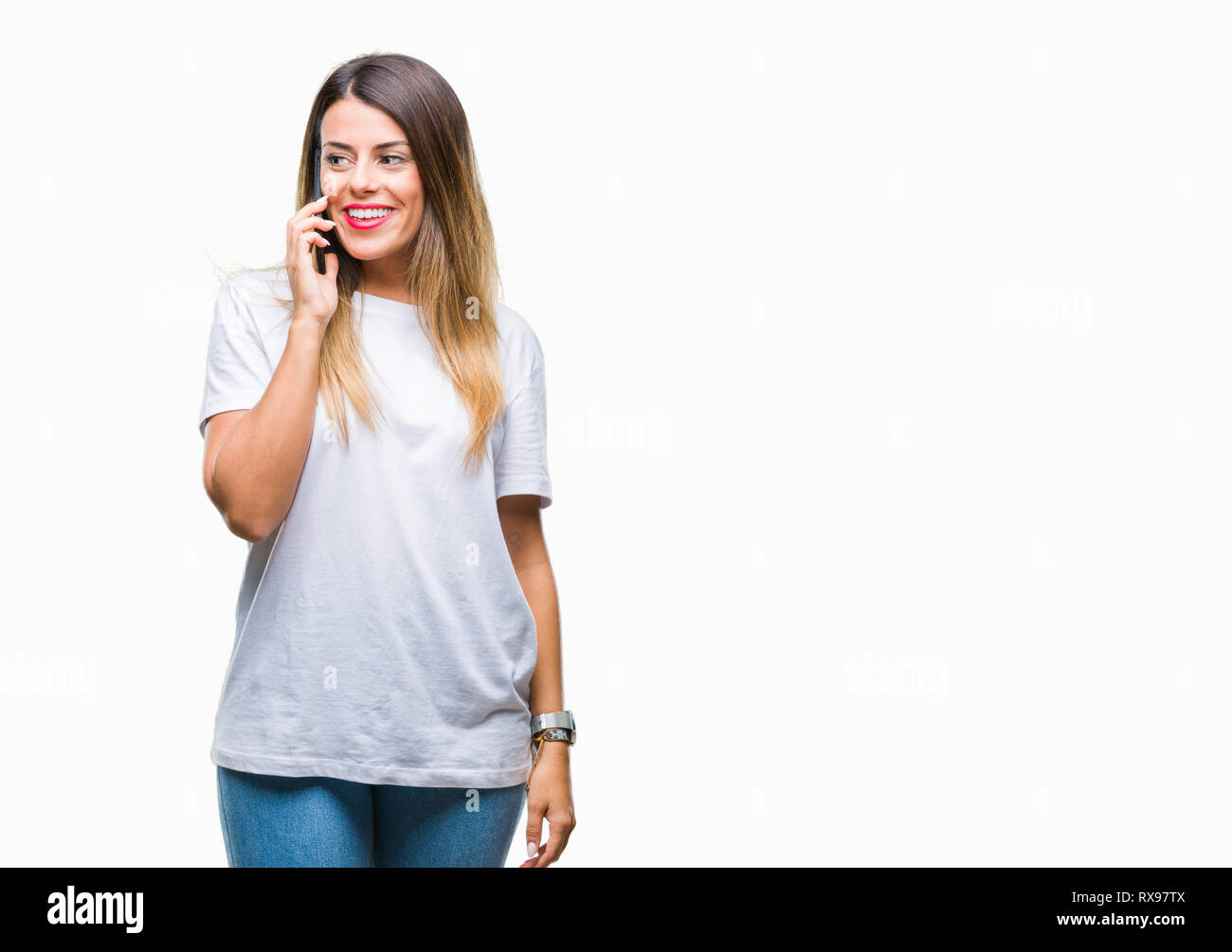 Young beautiful woman speaking calling using smartphone over isolated ...