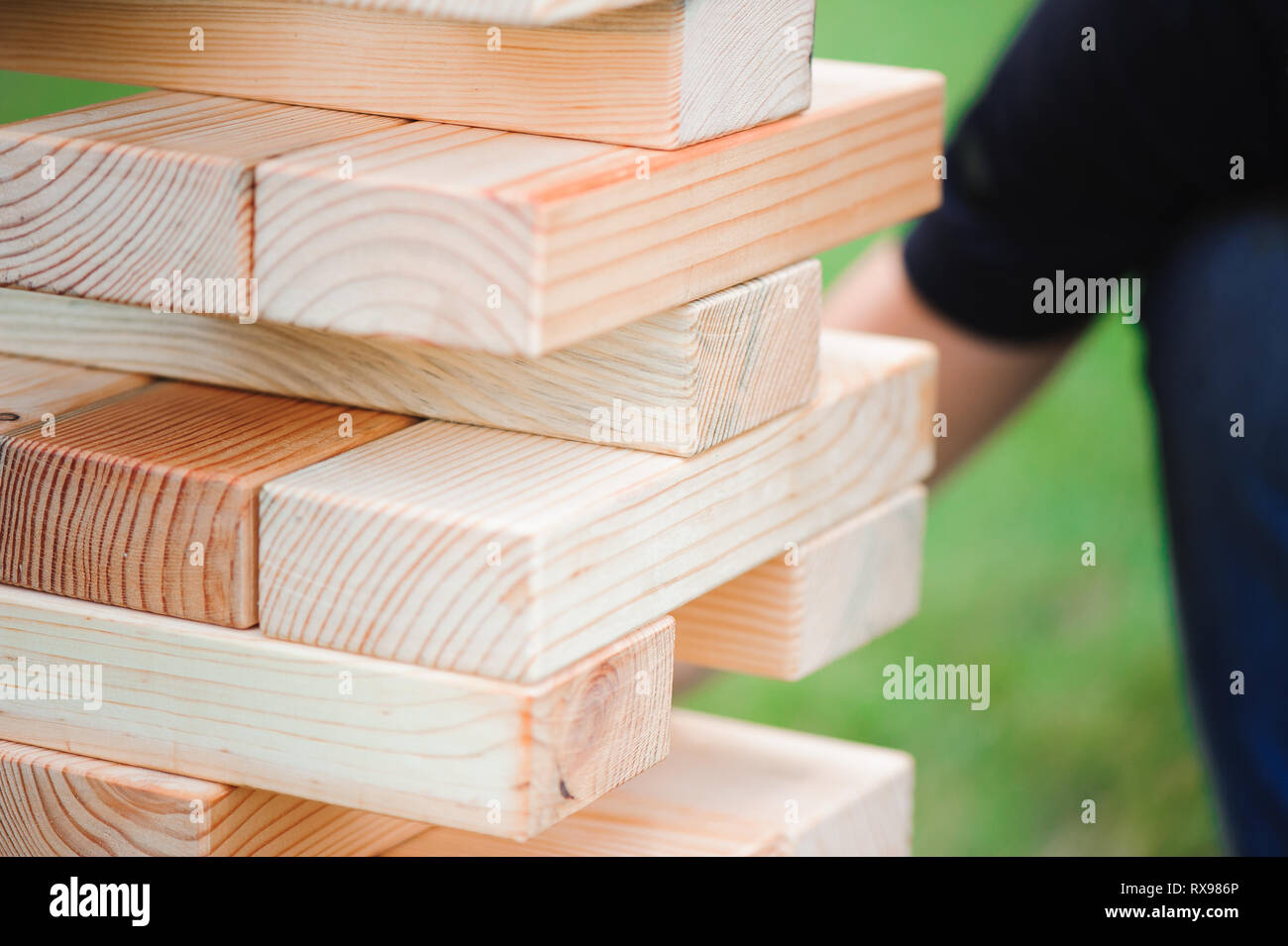 Giant Outdoor Block Game. The tower from wooden blocks Stock Photo - Alamy