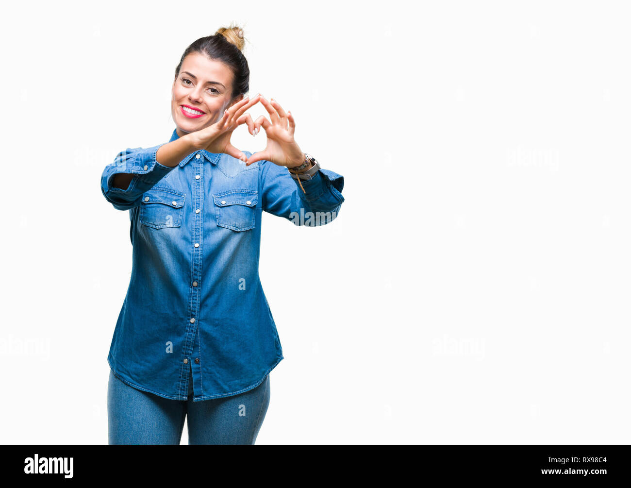 Young beautiful woman over isolated background smiling in love showing ...