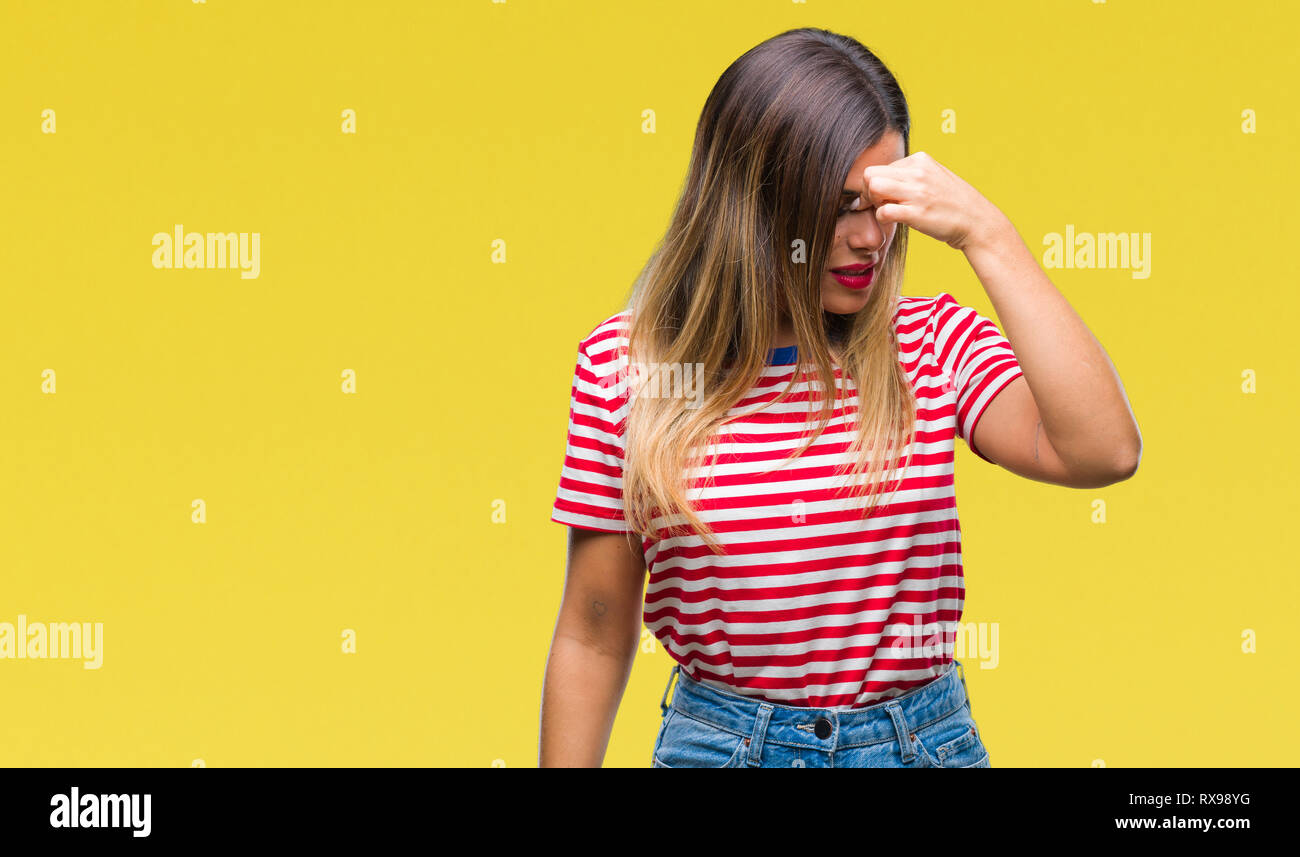 Young beautiful woman casual look over isolated background tired ...