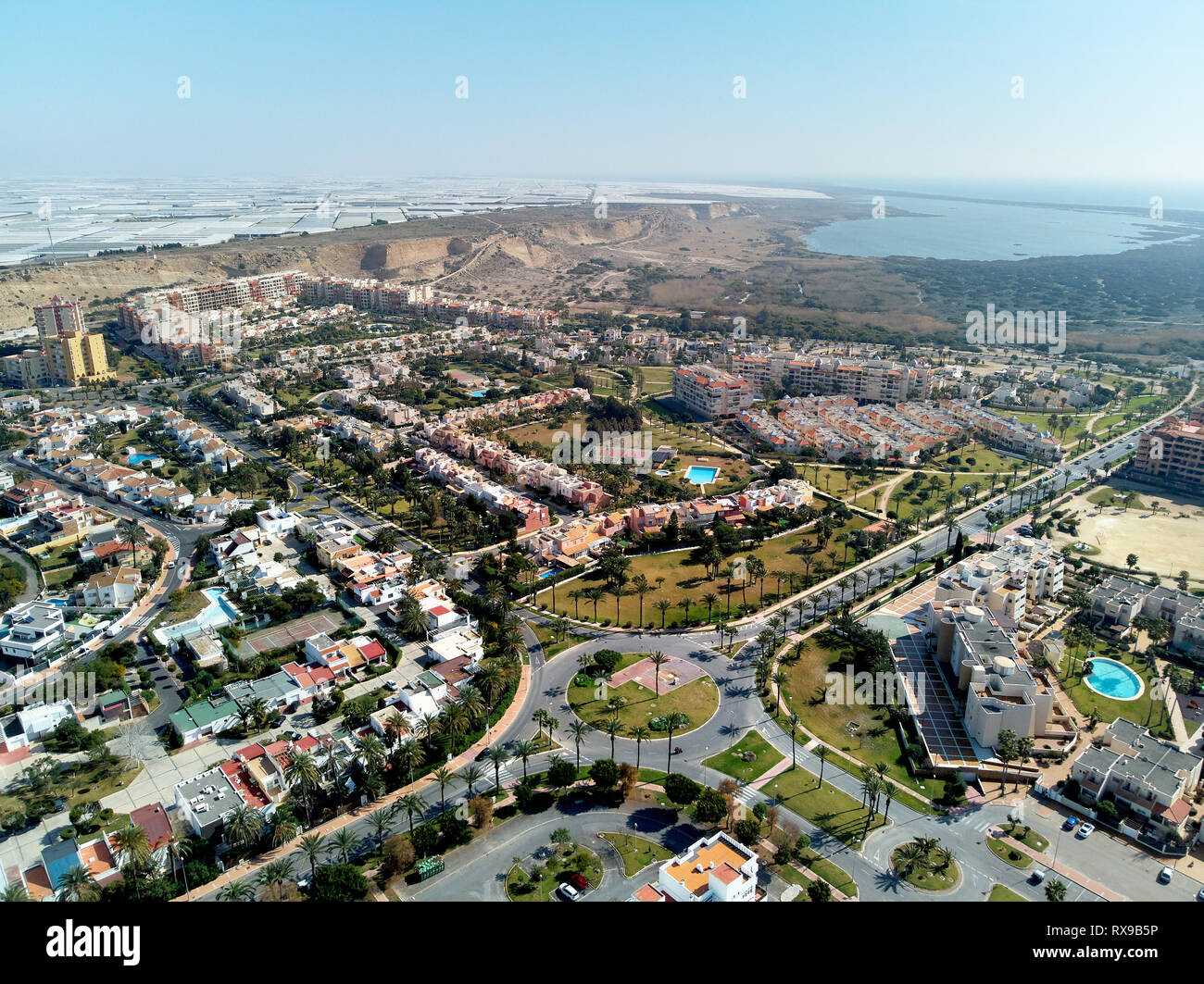 Aerial wide drone point of view photography Almerimar townscape with ...