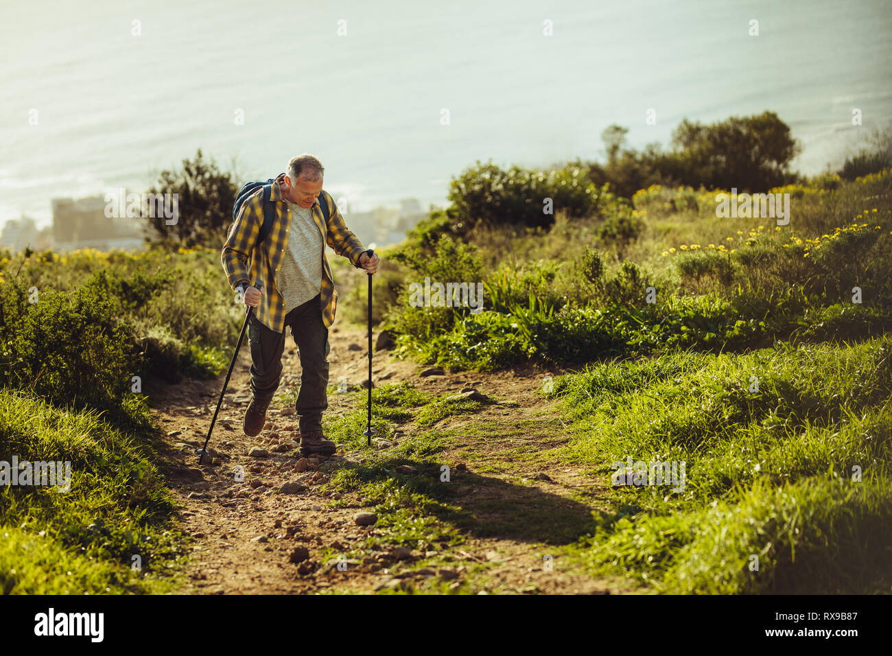 Senior hiking poles hi-res stock photography and images - Alamy