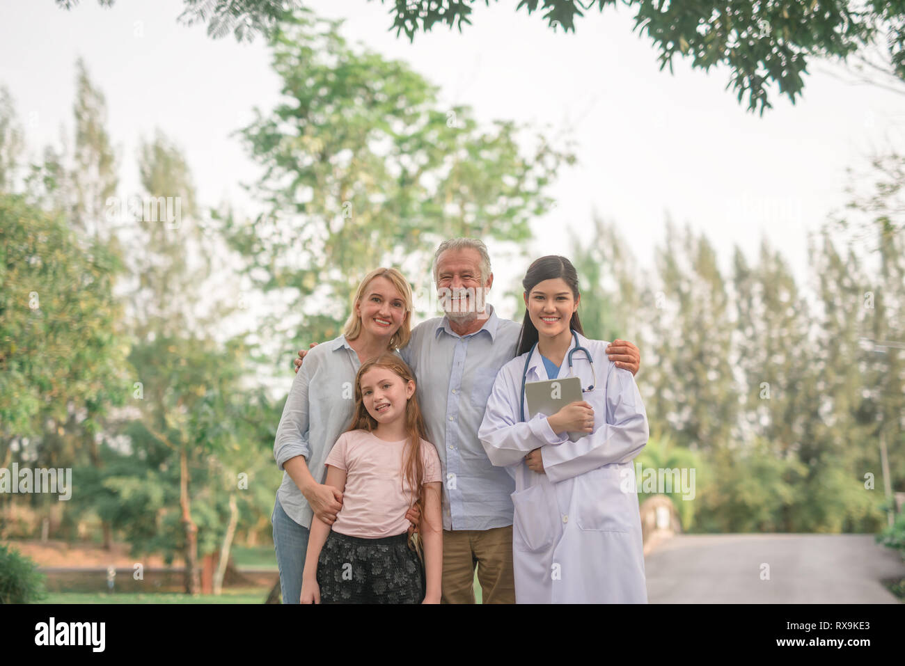 portrait family with doctor Stock Photo - Alamy