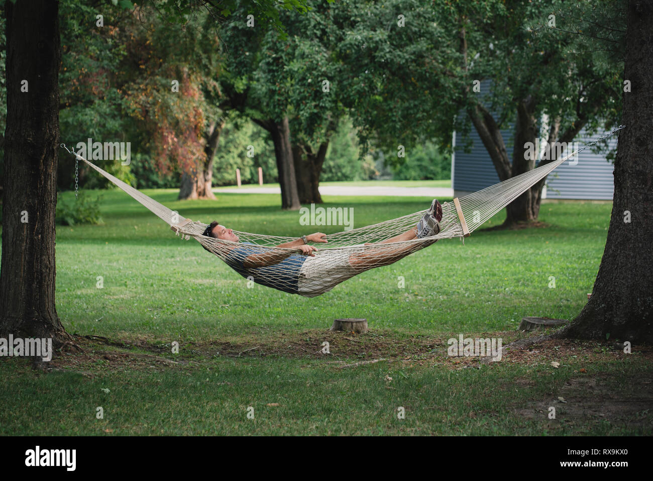 Old man in hammock hi-res stock photography and images - Alamy