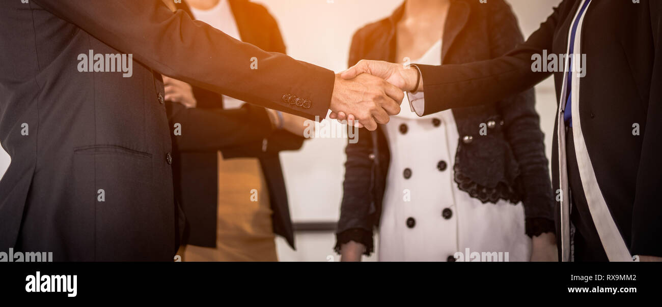 Business people partnership handshake concept. Group businessman ...