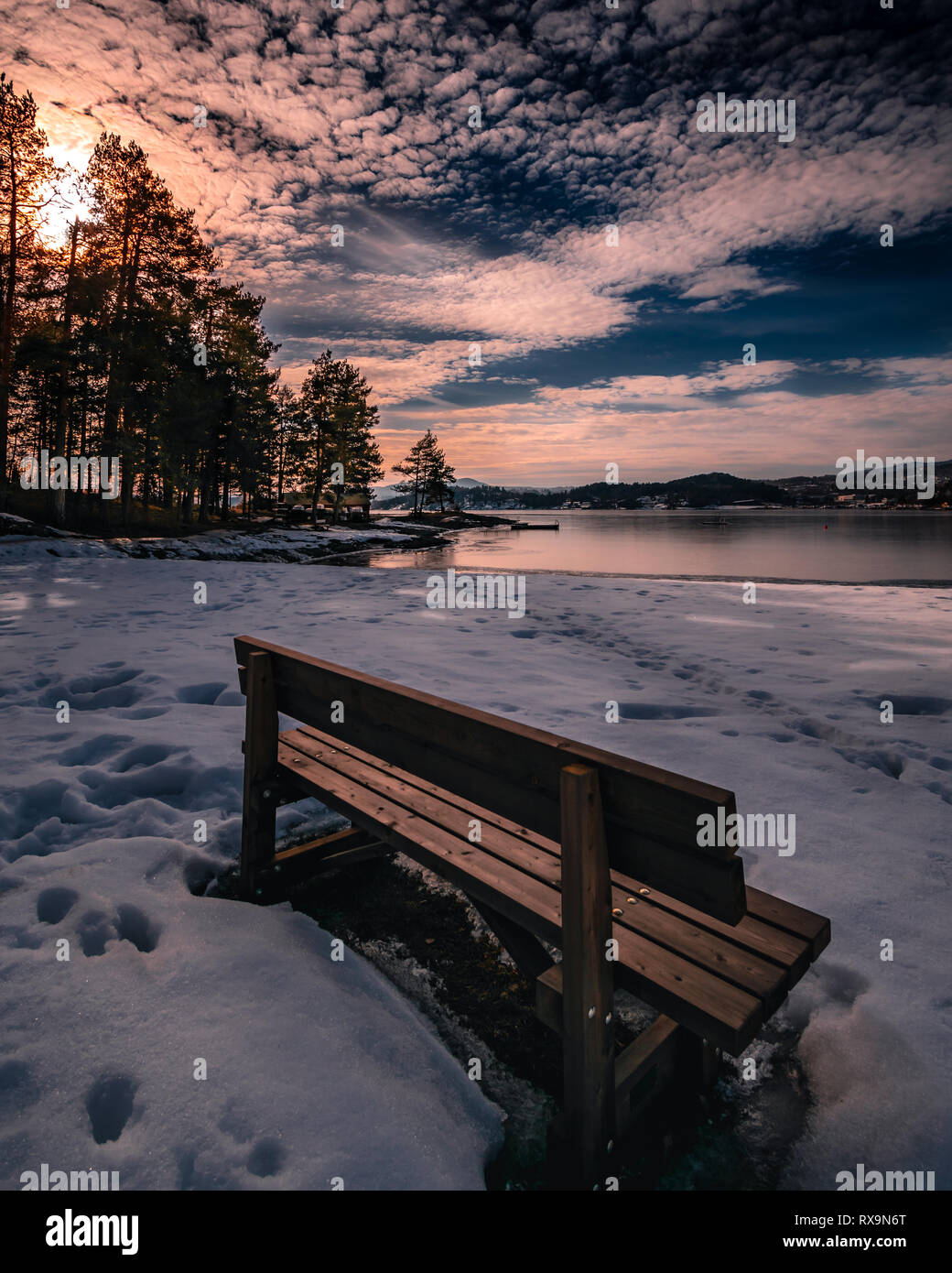 Bench looking at the water Stock Photo - Alamy