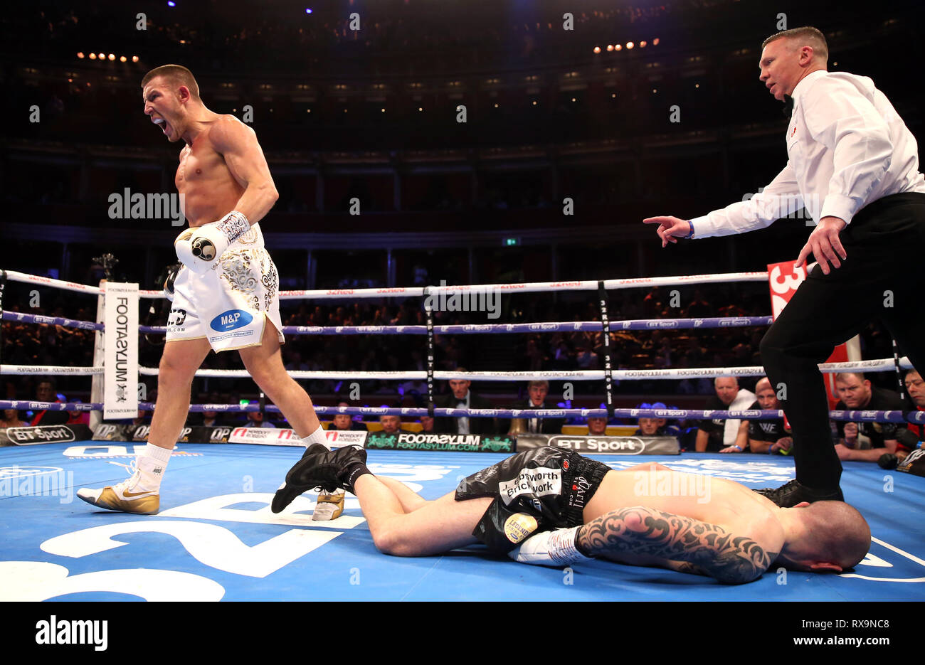 Liam Williams knocks down Joe Mullender for the first time during the ...