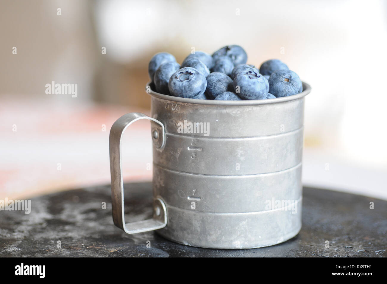 Fresh blueberries with sugar in a bowl Stock Photo - Alamy
