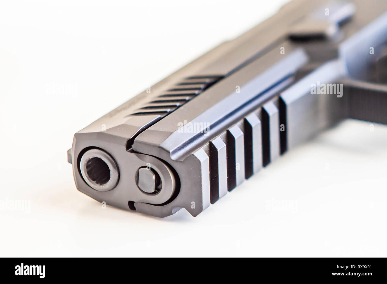 New handgun white background isolated close up Stock Photo - Alamy